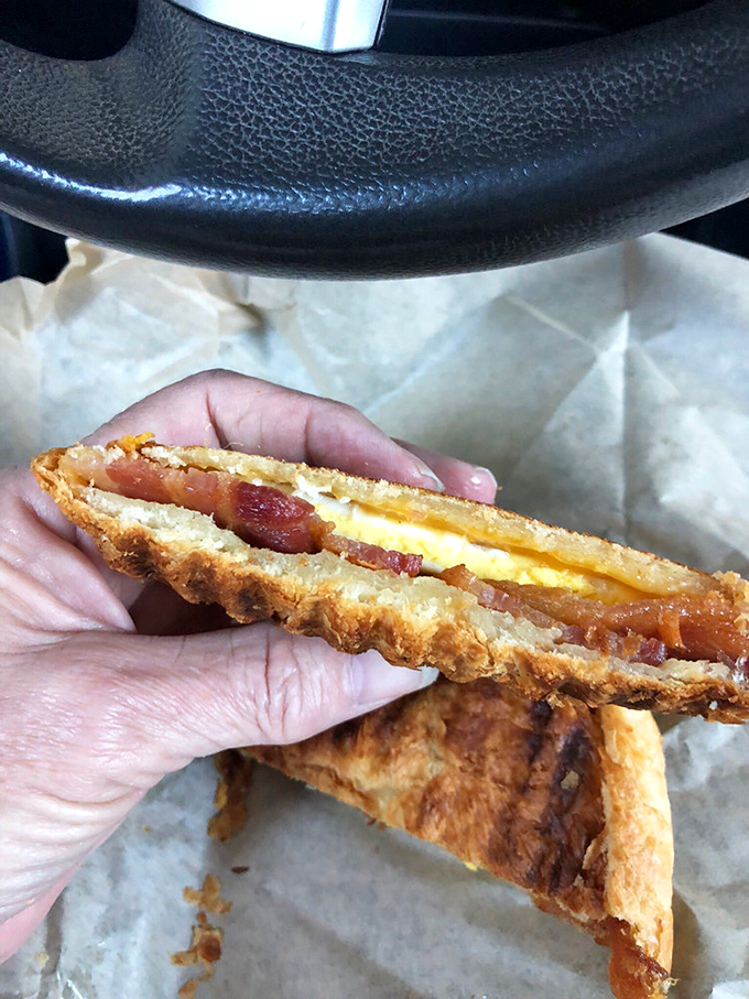 Vehicle for breakfast or masterpiece of butter and egg? This croissant sandwich answers with a resounding "Both!"