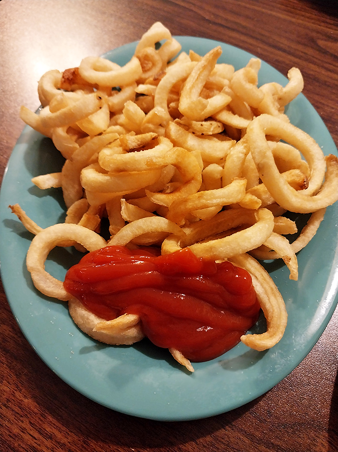 Curly fries: the rebellious teenagers of the potato world, refusing to conform to straight-line society. Pass the ketchup, please.
