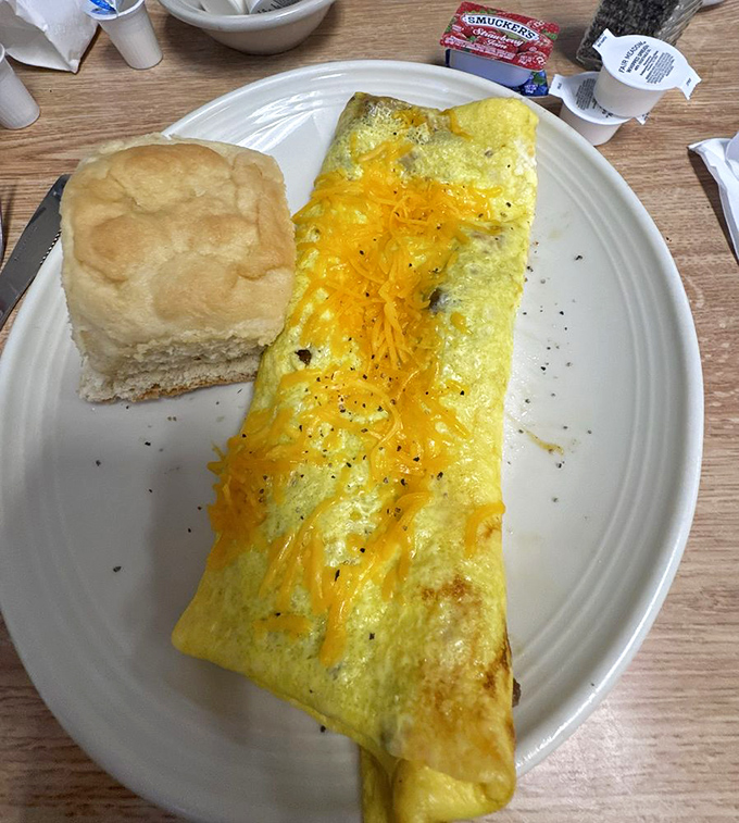 This cheese-blanketed omelet isn't just folded&mdash;it's lovingly tucked around vegetables and meat like a savory bedtime story.