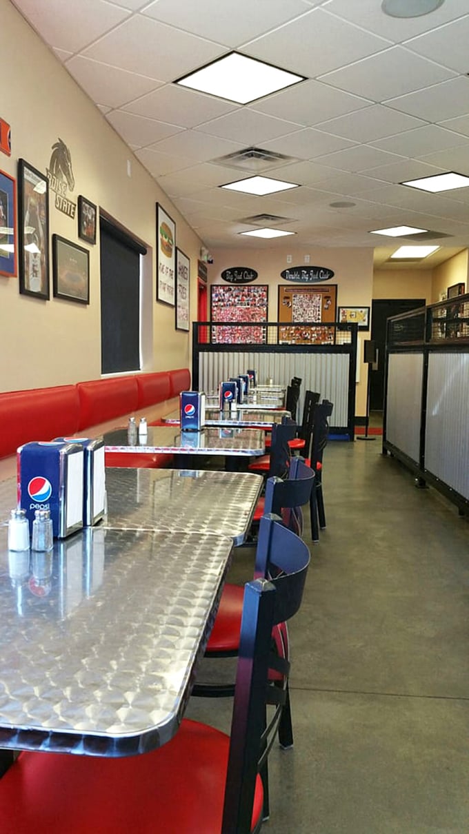 The Wall of Fame looms in the background, silently judging whether you'll join the ranks of burger champions or surrender.