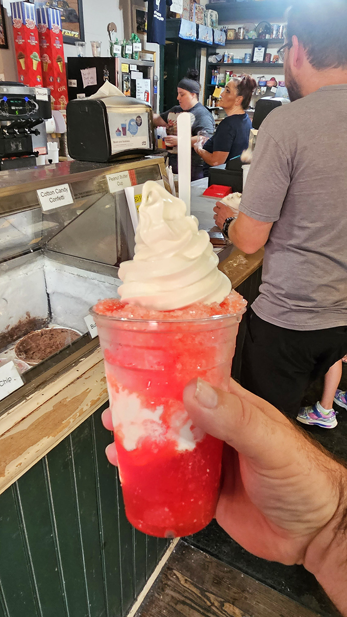 That snowball isn't just crushed ice with flavor&mdash;it's summer in Maryland distilled into portable form. The soft serve crown makes it royalty.