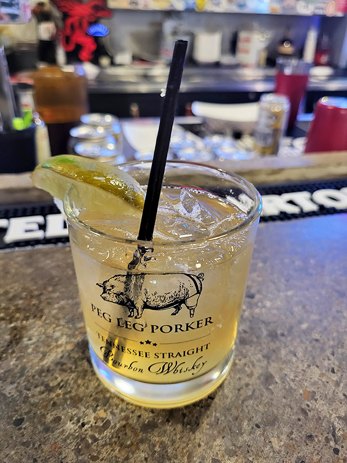 Their signature cocktail served in a branded glass &ndash; because even your drink deserves to be part of the Peg Leg Porker experience. 