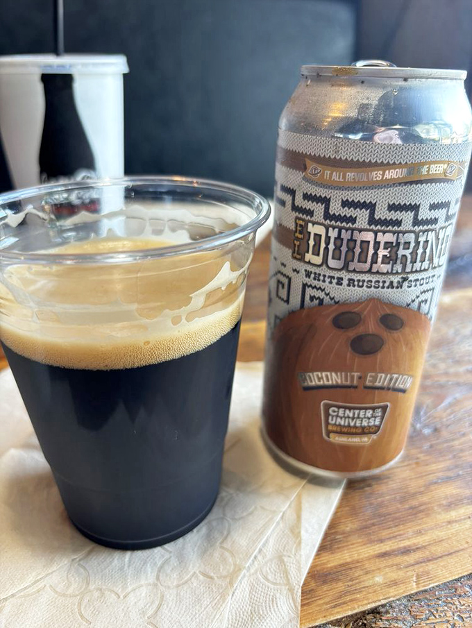 A craft beer from Center of the Universe Brewing Company stands ready to perform its sacred duty: cutting through rich barbecue while adding its own complex notes.