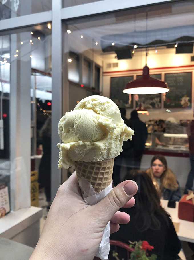 This cookies and cream masterpiece isn't just dessert&mdash;it's therapy in a cone, with a chocolate-dipped rim that says "I care about your happiness."