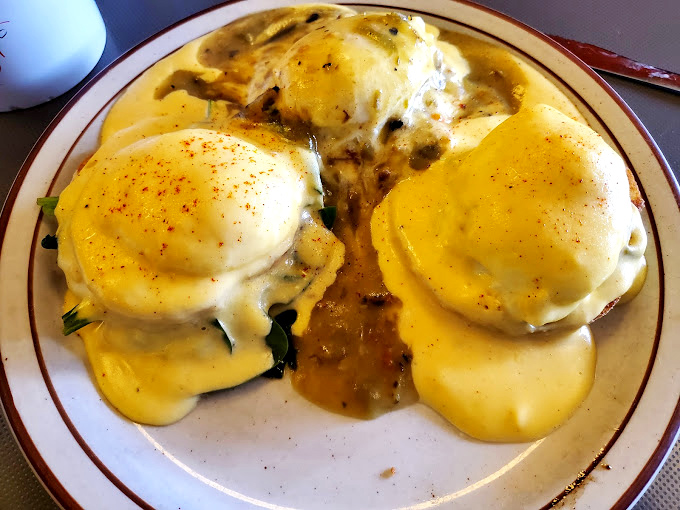 Eggs Benedict &ndash; where hollandaise sauce flows like liquid gold over perfectly poached eggs. Breakfast doesn't get more luxurious without requiring formal attire.