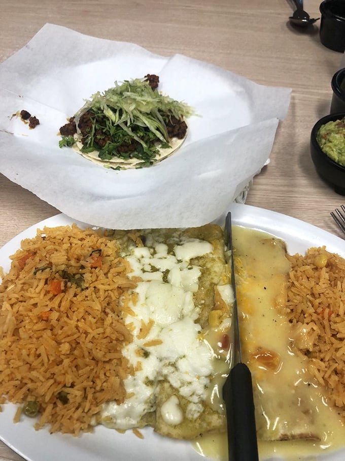 Double rice? Someone understands the importance of proper sauce-soaking architecture. This plate is engineering and art combined.