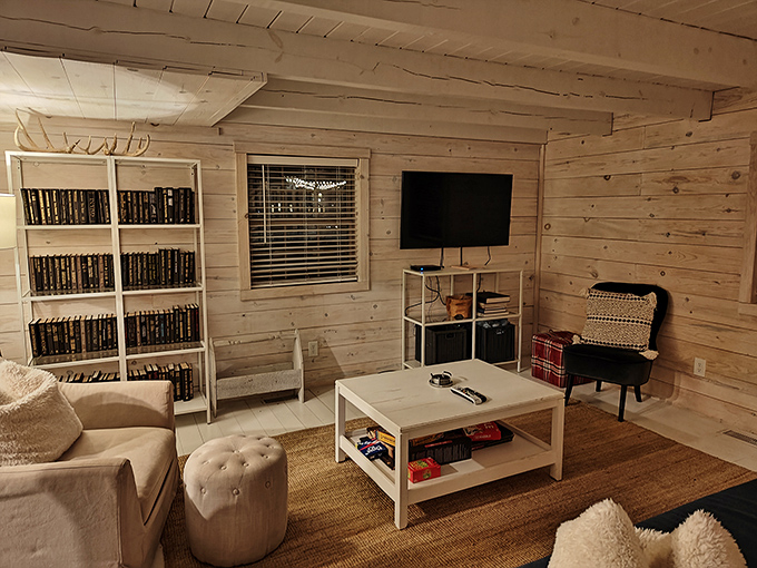 A cozy retreat within stone walls, this wood-paneled sanctuary offers the perfect place to unwind after a day of castle exploration.