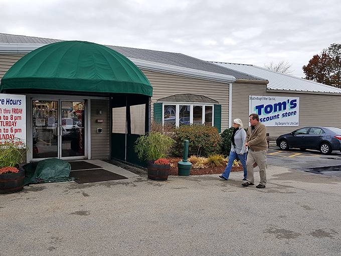 The green awning marks the spot where savvy shoppers enter and emerge victorious, wallets still surprisingly intact.