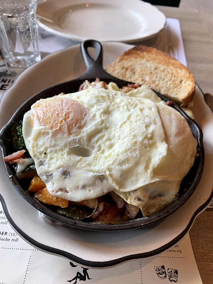 Eggs that could make a rooster proud blanket a medley of roasted vegetables. A skillet so photogenic it deserves its own Instagram account.