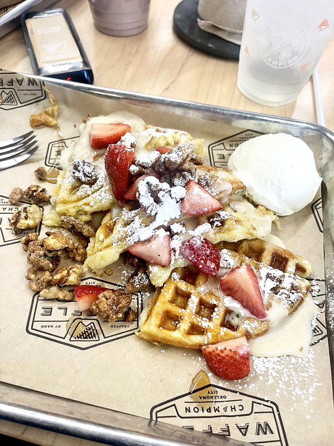 Sweet breakfast dreams are made of this: strawberries and cream cheese meeting their waffle destiny.