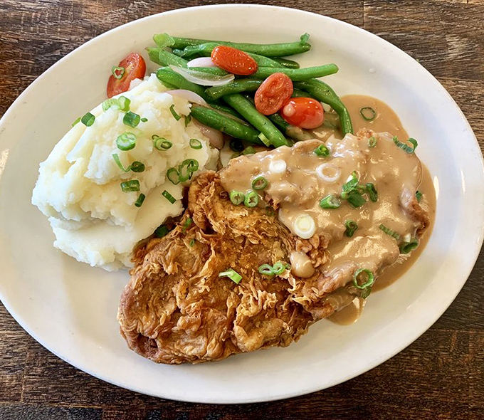 Country-style comfort on a plate. That chicken looks like it would make your grandmother both jealous and proud.