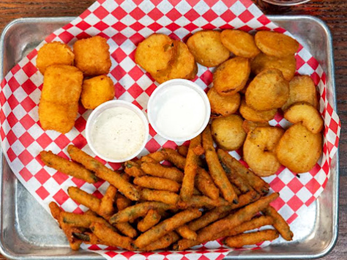 These aren't just any fried pickles—they're little golden discs of tangy, crunchy joy that disappear faster than your resolution to "just have one."