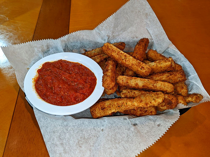 These aren't just fried zucchini sticks&mdash;they're vegetable candy. Crispy, golden, and ready for a dip in that vibrant marinara sauce.