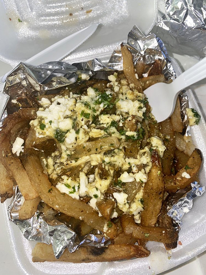 Greek fries topped with feta&mdash;because regular fries weren't already tempting enough. This is what potato dreams are made of.