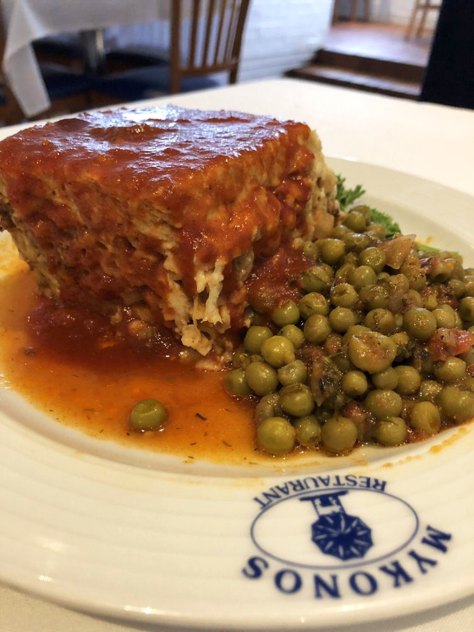 This isn't just Greek lasagna; it's a layered masterpiece of comfort that makes you want to hug whoever invented b&eacute;chamel sauce.