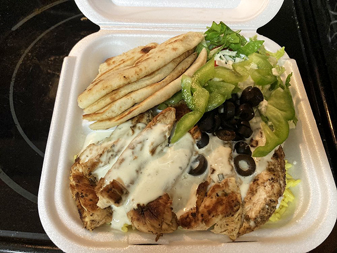 Grilled chicken that's had a proper introduction to Mediterranean herbs and spices, served with a tzatziki sauce that deserves its own fan club.