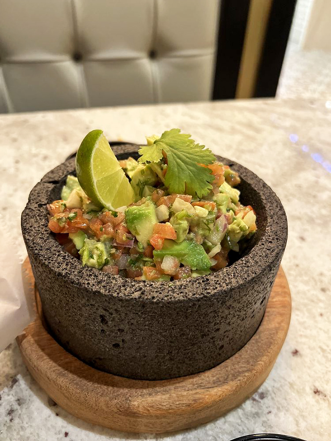 Fresh guacamole in a traditional molcajete&mdash;where avocados go to fulfill their highest purpose and cilantro finally gets the respect it deserves.