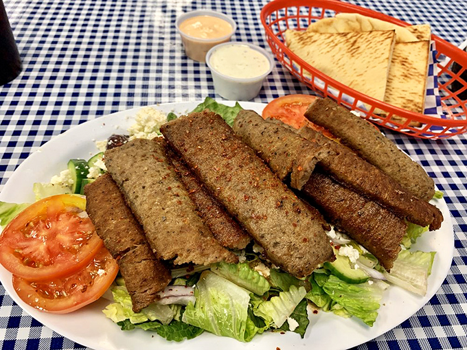 Who needs a Caesar when you can have a gyro salad? Sliced meat lounging atop crisp greens like it's on a Mediterranean vacation.