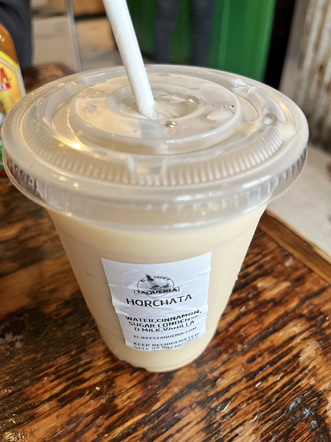 The horchata comes labeled like fine wine, but disappears faster – a creamy cinnamon-vanilla symphony that makes you wonder why we even invented soda.