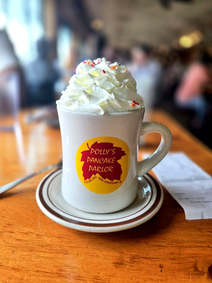 Hot chocolate that's dressed for a special occasion. That whipped cream tower deserves its own zip code and possibly property taxes.