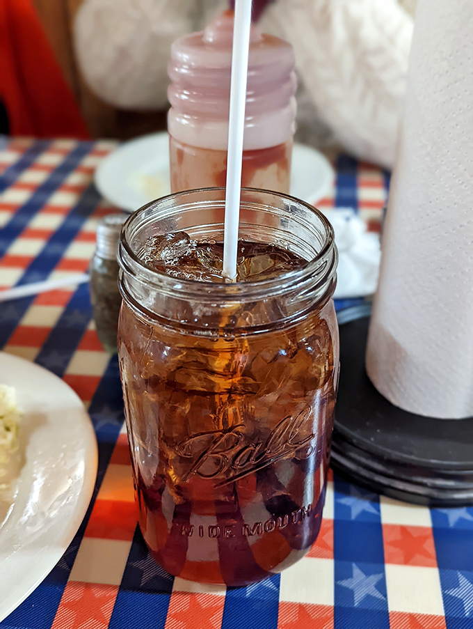 Sweet tea served in a Mason jar isn't just a beverage&mdash;it's liquid Southern hospitality, amber-colored proof that good things come to those who sip.