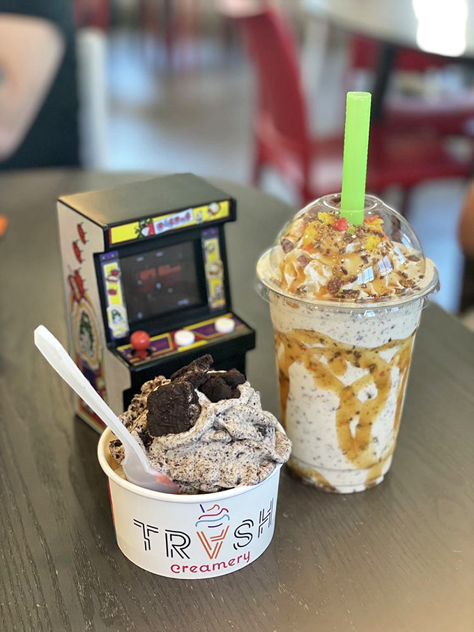 Dessert duality at its finest&mdash;a cup for now, a shake for later, with a miniature arcade game standing guard against potential treat thieves.