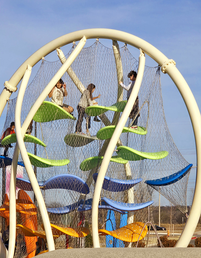 The climbing structure proves that Tulsa Premium Outlets understands shopping's golden rule: keep the kids entertained and you can browse another hour.