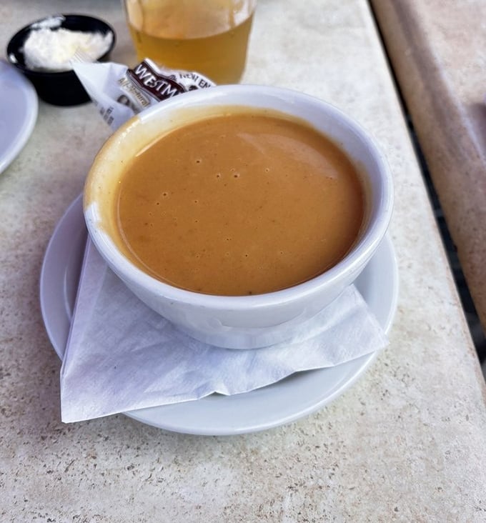 This lobster bisque isn't just soup&mdash;it's a warm, creamy hug in a bowl that makes you wonder why anyone would ever eat anything else on a chilly coastal day.