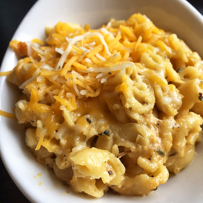 This mac and cheese isn't just a side dish – it's the supporting actor that steals every scene with its creamy, cheesy, perfectly seasoned performance.