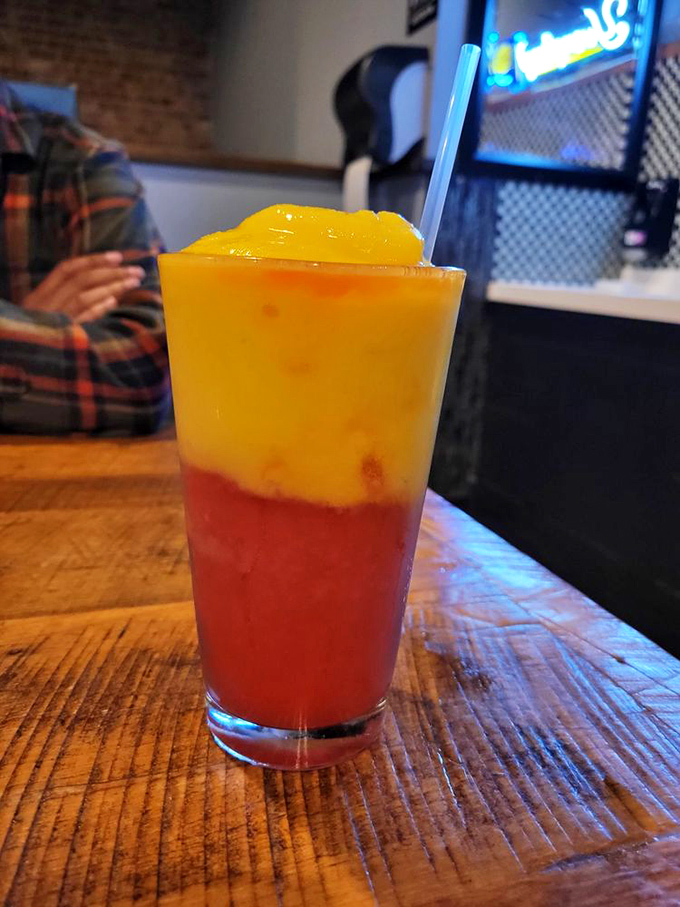 A two-toned tropical libation that looks like a Midwestern sunset but tastes like a Caribbean vacation&mdash;no passport required.