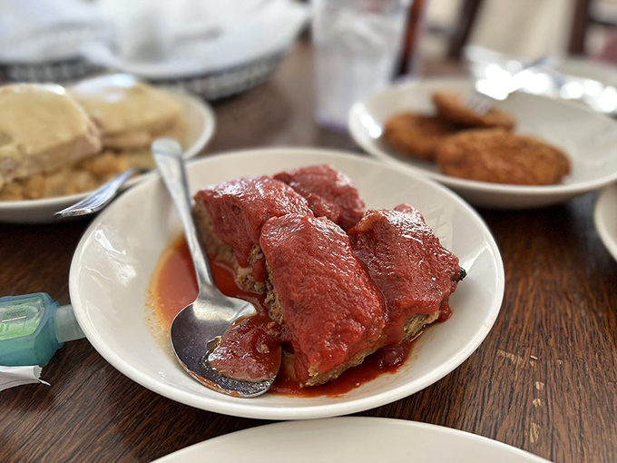 Meatloaf wearing tomato sauce like a prom dress—familiar, comforting, and dressed up just enough to make you feel special.