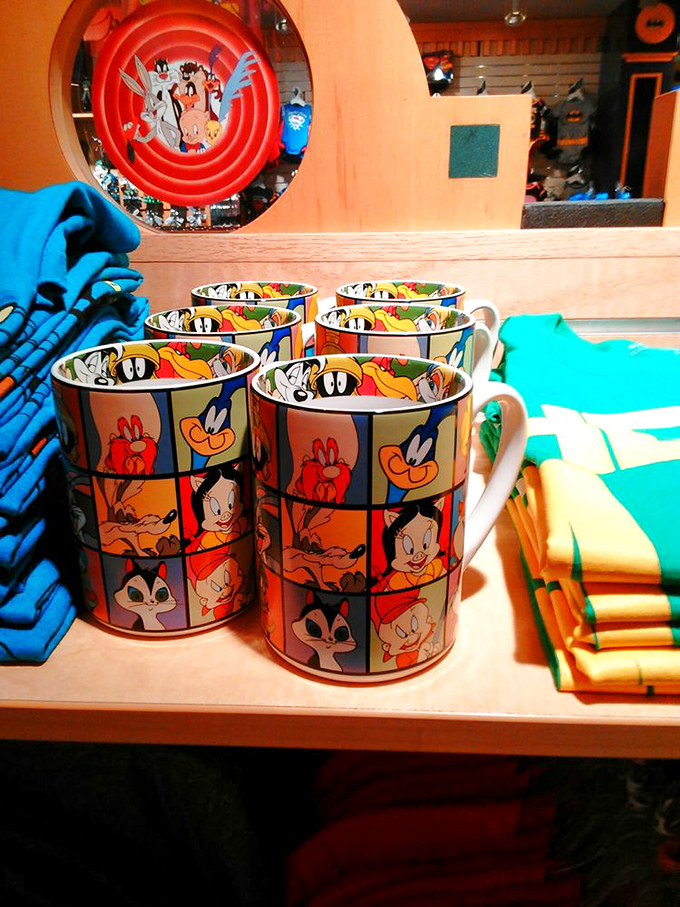 Souvenir mugs featuring classic cartoon characters&mdash;because nothing says "I survived The Boss" like sipping coffee from Bugs Bunny's face.