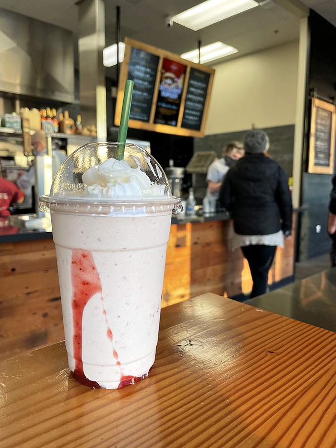 This strawberry milkshake isn't just a beverage&mdash;it's dessert in a cup, with that perfect swirl of whipped cream that begs for an Instagram moment. 