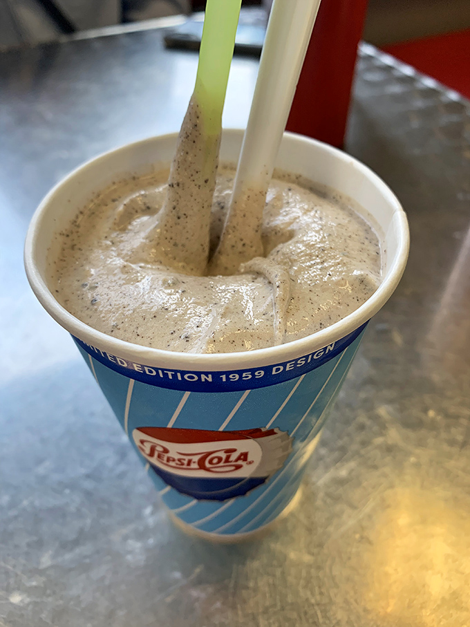 This isn't just any milkshake&mdash;it's the kind that brings all rational thought to a standstill. Speckled with what looks like cookie bits? Yes, please.
