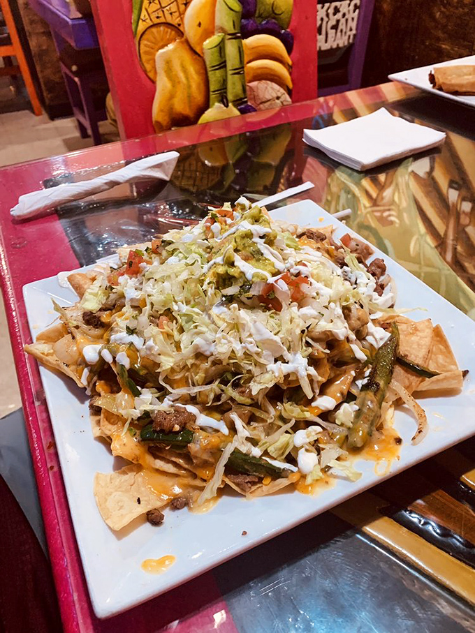 A plate of tacos with rice and beans isn't just lunch—it's a commitment to happiness. The holy trinity of Mexican comfort food.
