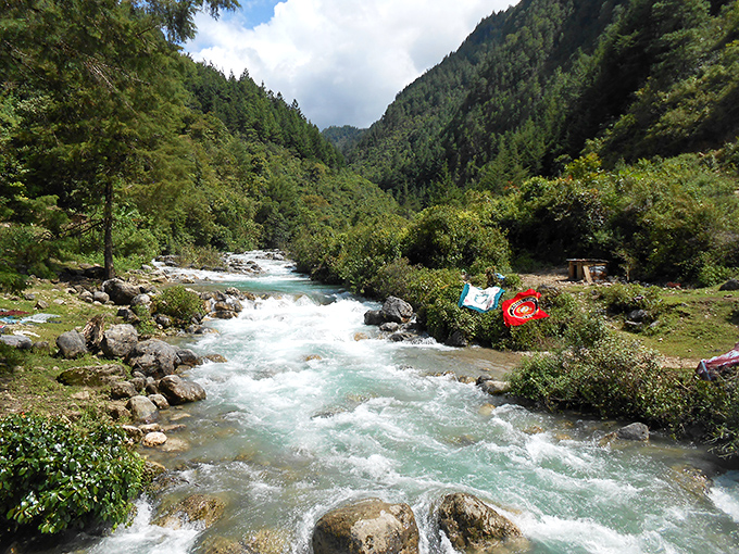 Crystal clear waters cutting through forested wilderness &ndash; the kind of natural beauty that doesn't charge admission or require reservations.