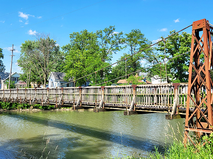 This charming footbridge doesn't just connect two riverbanks &ndash; it links present-day strollers with generations who've paused mid-crossing to watch the water flow beneath.