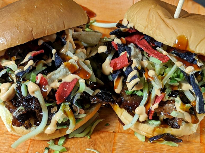 These sliders aren't playing around. Topped with slaw and special sauce, they're like tiny flavor bombs that'll make you forget your table manners.