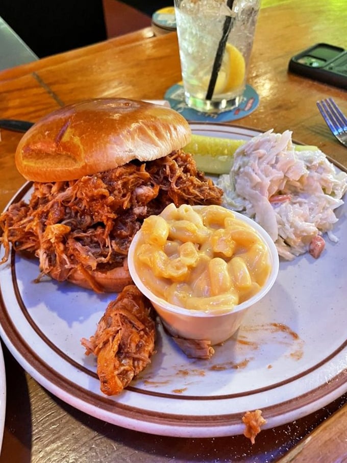 This pulled chicken sandwich isn't just a meal&mdash;it's an architectural marvel of tender meat, sauce, and bread that somehow maintains structural integrity until the last bite.