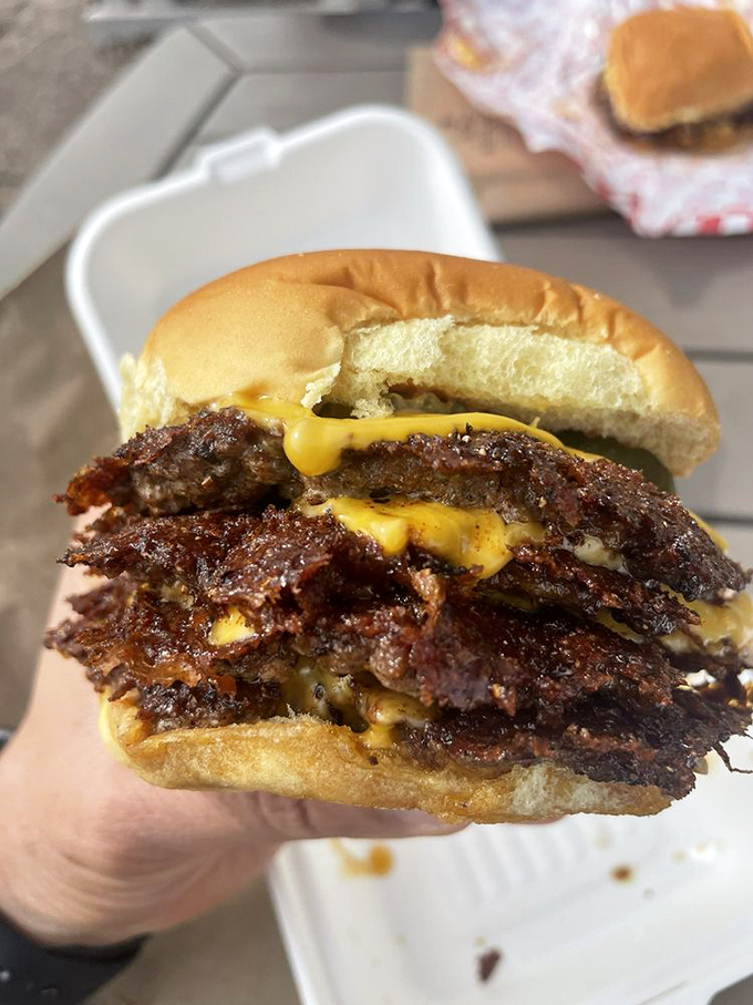 Look closely &ndash; those aren't just patties, they're a manifesto about how beef should be treated. The cheese acts as delicious mortar.