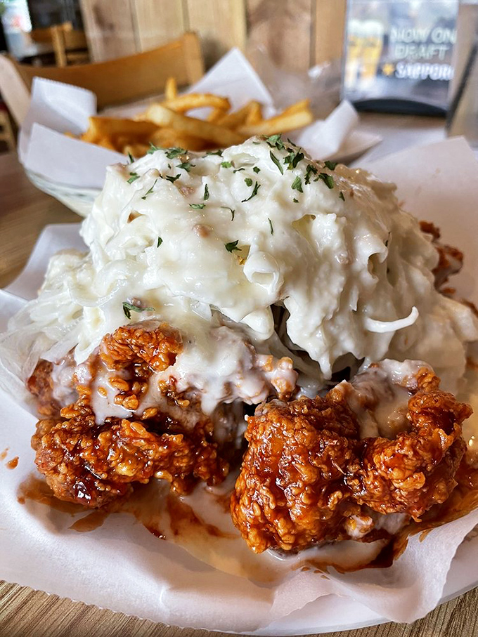 Snow onion chicken &ndash; where crispy fried chicken meets creamy sauce and fresh onions. It's like winter and summer decided to become best friends on your plate.