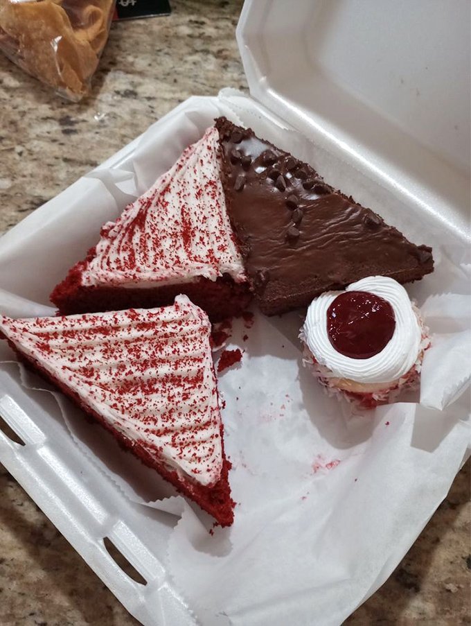 A dessert rainbow in a box&mdash;red velvet, chocolate fudge, and a cherry-topped treat make this the adult version of a treasure chest.