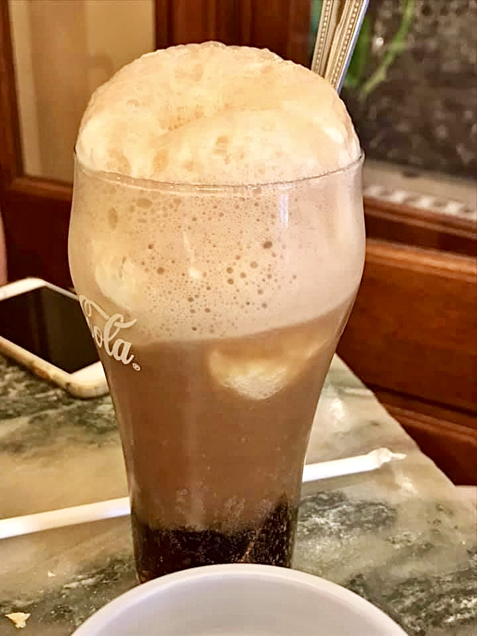 That perfect foam crown on a root beer float—like the frothy head on a Guinness, except this buzz comes purely from sugar and nostalgia.