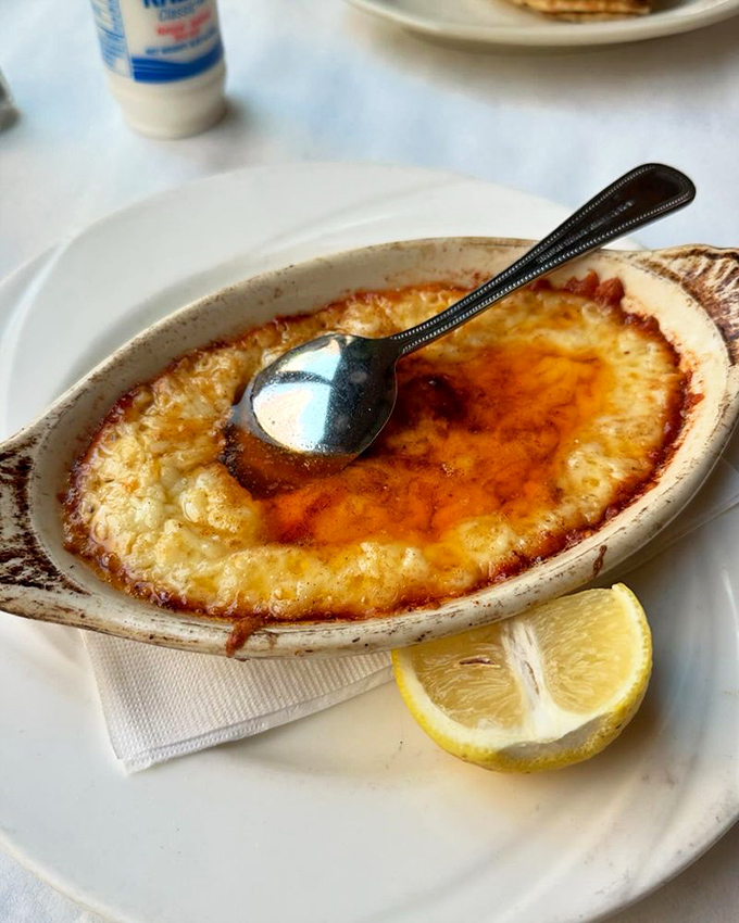 Saganaki brings the drama&mdash;bubbling cheese with a golden crust that makes you want to applaud before you devour it.