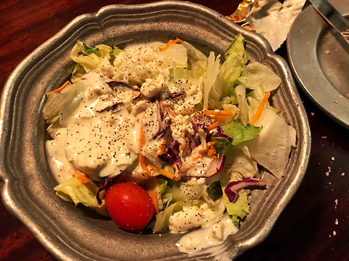 Even the house salad gets the royal treatment&mdash;crisp greens and fresh vegetables dressed impeccably, like they're headed to a produce prom.