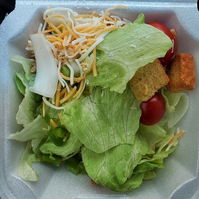 A side salad that somehow manages to be both virtuous and satisfying. Those croutons aren't from a box&mdash;they've got stories to tell.