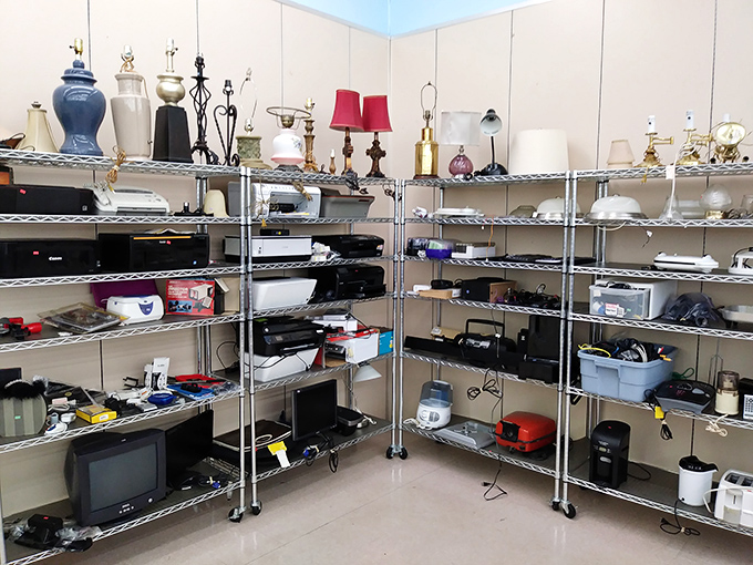 Technology's retirement home or second chance? These shelves of small appliances and electronics wait for someone who sees potential beyond the gently used exterior.