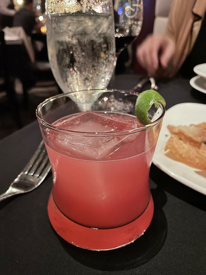 That vibrant cocktail isn't just a drink&mdash;it's liquid courage before you commit to deciding between the ribeye and the New York strip.