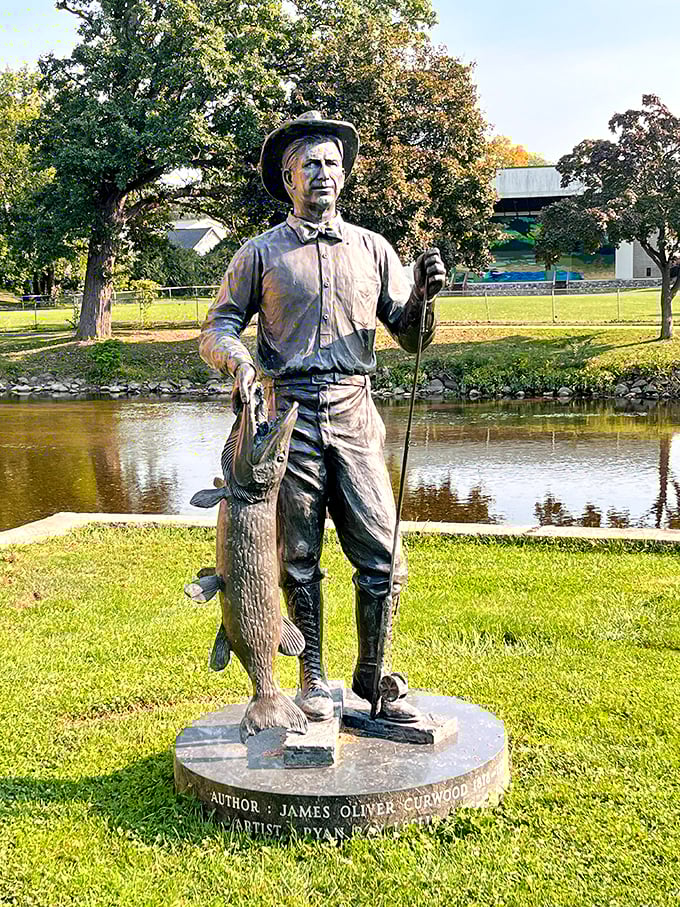 Bronze sculptures throughout the park connect visitors to the wilderness themes that dominated Curwood's writing and conservation efforts.