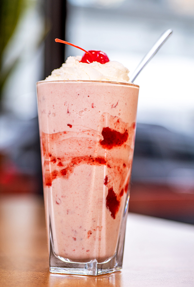 The classic diner setup&mdash;where coffee flows freely and breakfast dreams come true. That counter has heard more Chicago stories than a cab driver.